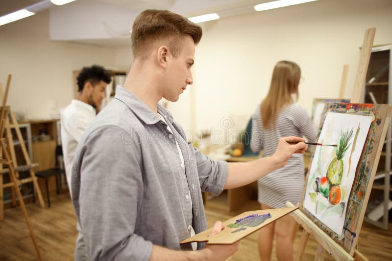 Art Students Painting in Workshop Stock Image - Image of painting, male ...