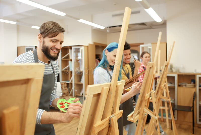 Art Students Painting in Workshop Stock Image - Image of female ...