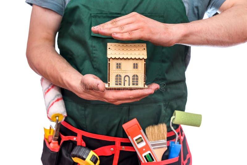 Artesano Con Modelo De Casa De Madera Aislado En Blanco Foto de archivo ...