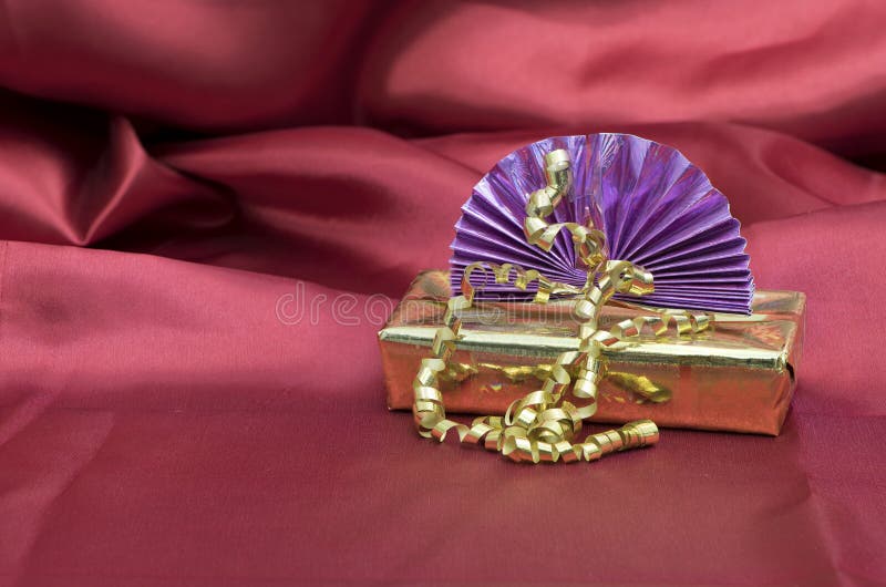 Artfully Wrapped Gift Presented Luxury Red Cloth Stock Photo - Image of ...