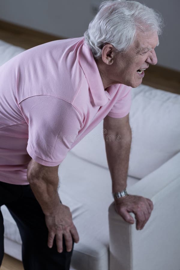 Man with osteoarthritis stock photo. Image of expression - 51936228