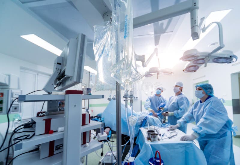 Arthroscope Surgery. Orthopedic Surgeons in Teamwork in the Operating ...