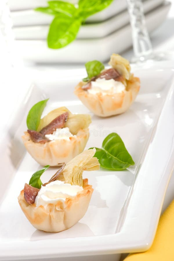 Artichoke, Anchovy and Cream Cheese Canapes Stock Photo - Image of meal ...