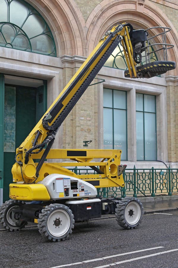 Articulated Boom Lift stock photo. Image of tall, parked - 147123402