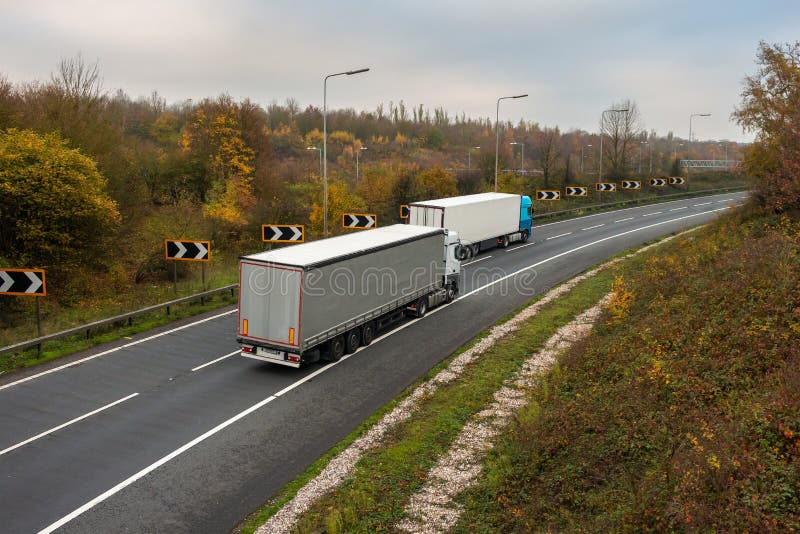 Articulated Lorries on the Road Stock Image - Image of lorries ...