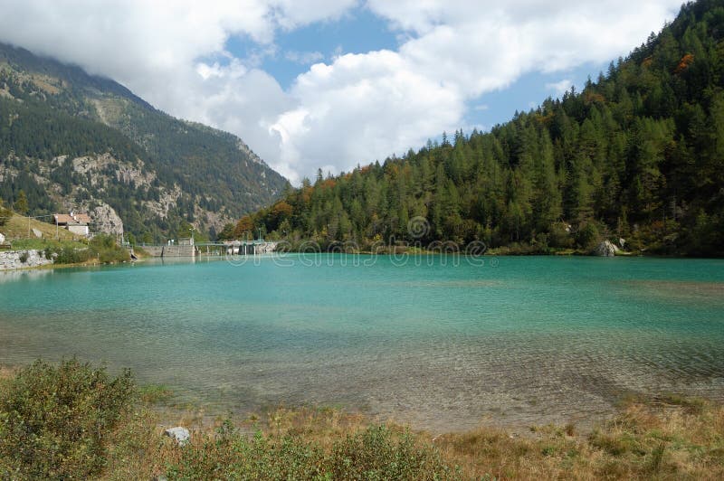 Artificial alpine lake stock photo. Image of europe, outdoors - 14560804