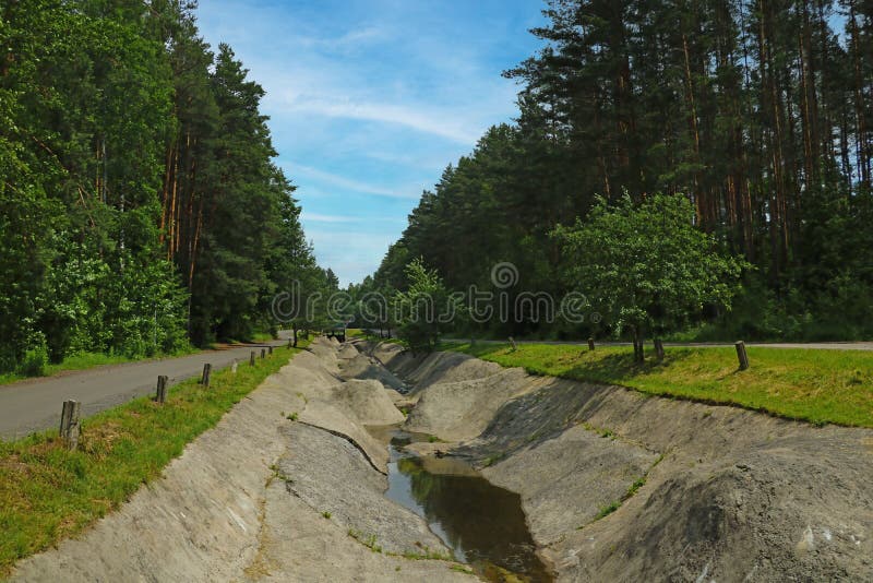 Artificial Canal without Water with Forest on the Background Stock ...