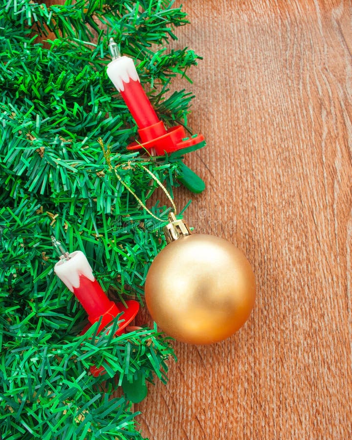 Artificial Christmas Tree, Electric Candles and Golden Ball Stock Photo ...