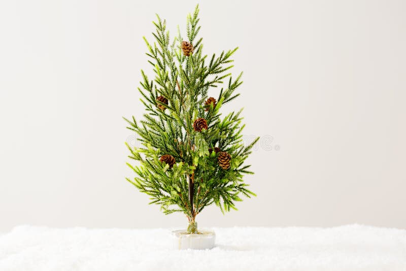 Artificial Christmas Tree is with Pine Cones. Stock Photo - Image of ...