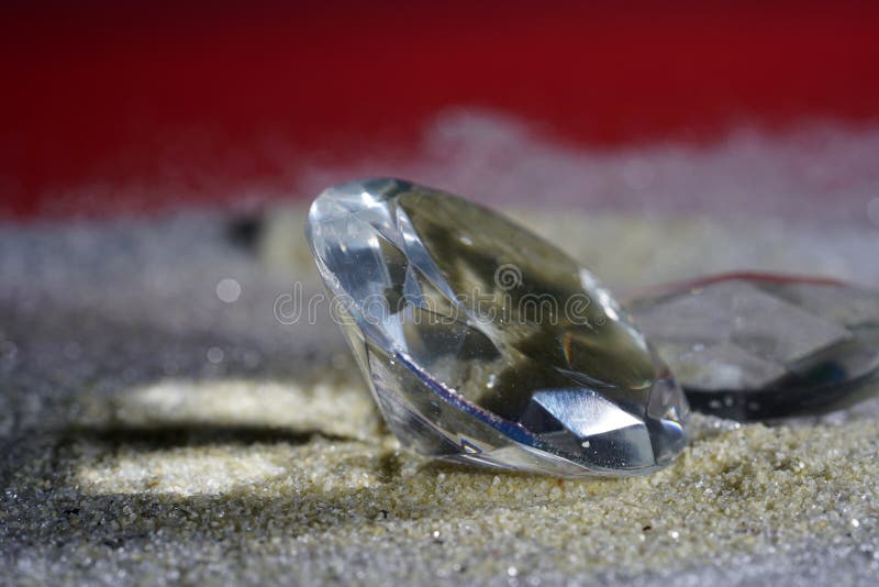 Artificial Diamonds Lying in the Sand Photographed in the Studio with ...
