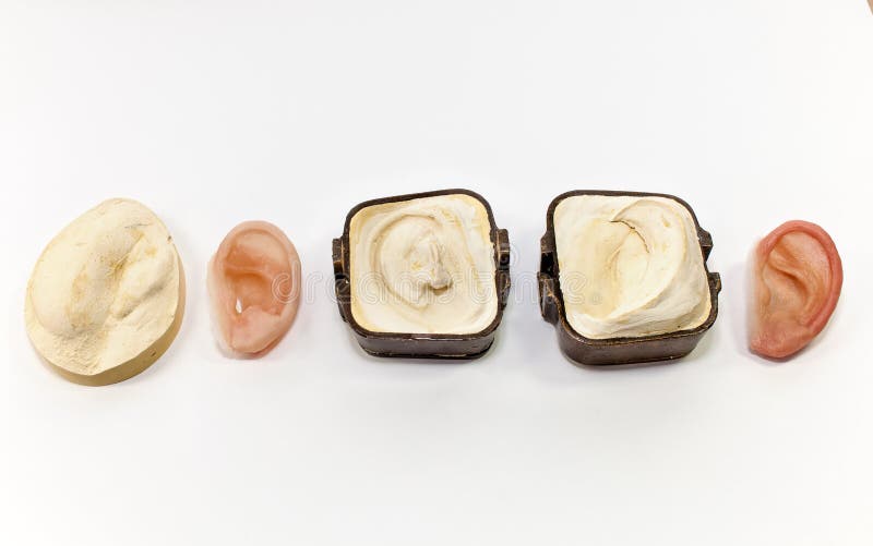 Artificial Ear Final Product and Plaster Forms Stock Photo - Image of ...