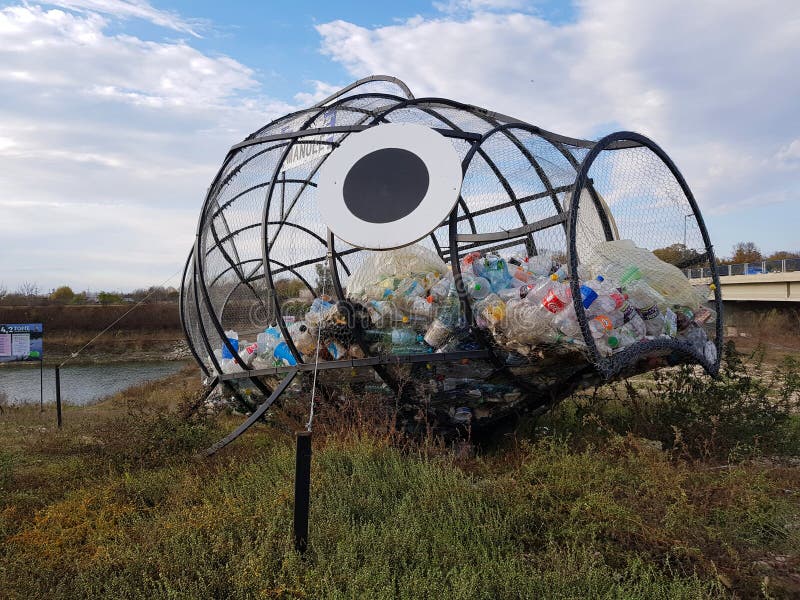 Plastic Pet Collector. Fish Shaped Container. Editorial Image - Image ...