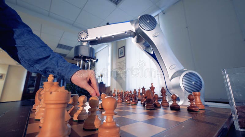Artificial Intelligence, Robot Chessplayer Playing Chess with a Man. 4K ...