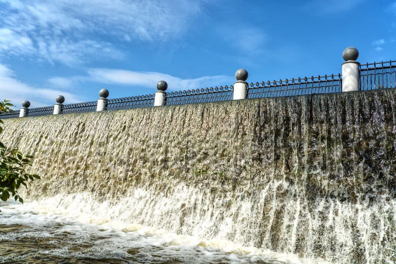Artificial low waterfall stock image. Image of flood - 104909603