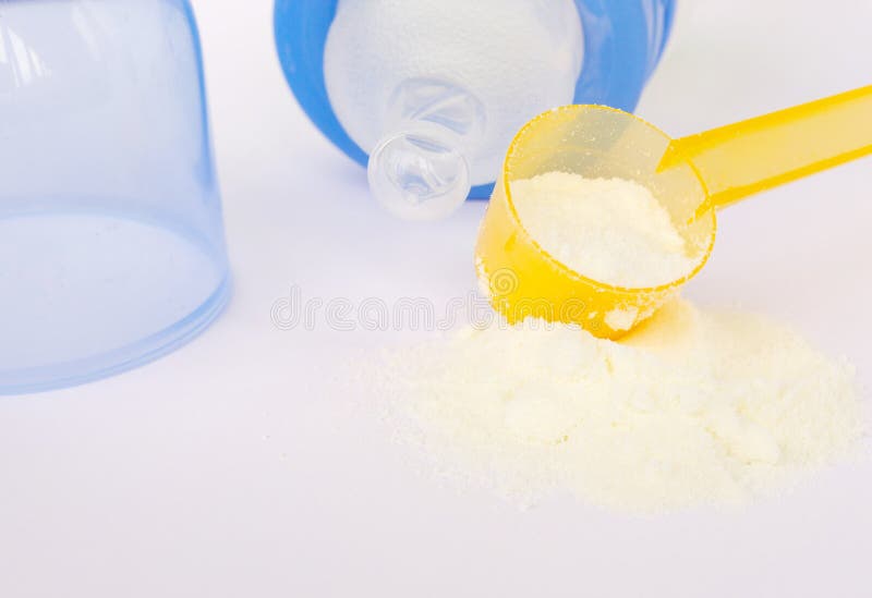 Artificial Powder Milk in a Measuring Plastic Spoon. Stock Image ...