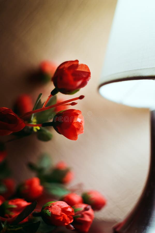 Artificial Red Flowers in Bright Light Bulb. Artificial Roses ...