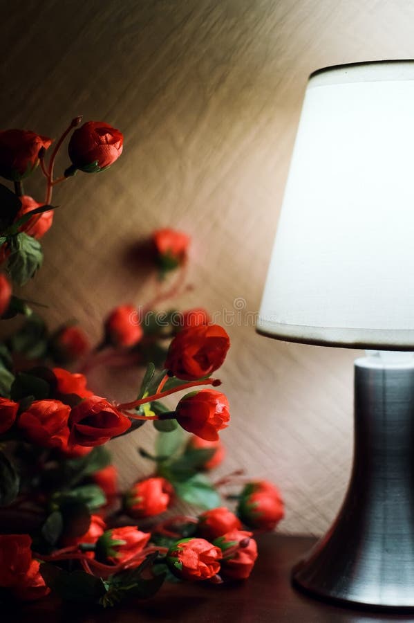 Artificial Red Flowers in Bright Light Bulb. Artificial Roses ...