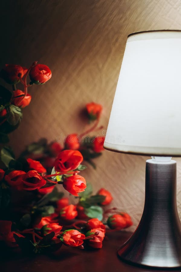 Artificial Red Flowers in Bright Light Bulb. Artificial Roses ...
