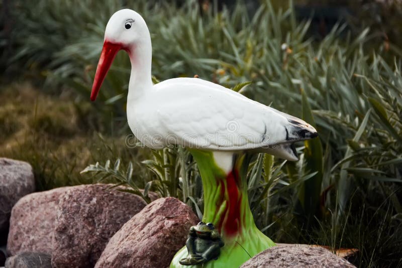Artificial stork stock photo. Image of nature, blue, yard - 40567534