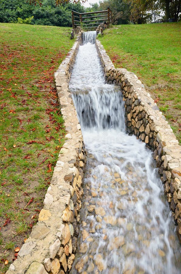Artificial stream stock photo. Image of shade, park, river - 46950386 Artificial stream stock photo. Image of shade, park, river - 46950386