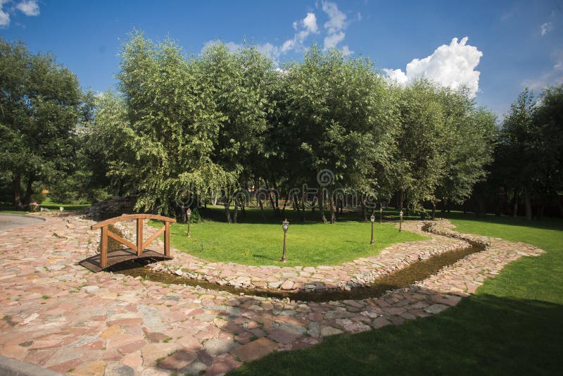 Artificial stream stock photo. Image of lawn, green, reservoir - 76396064