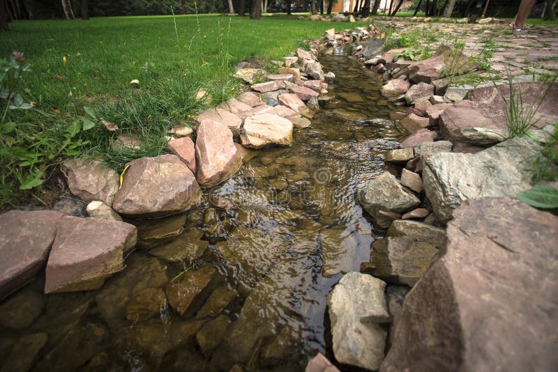 Artificial stream stock photo. Image of lawn, green, reservoir - 76396064