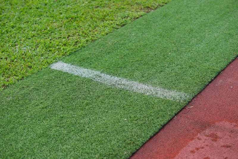 Artificial Track and Field with Green Grass Combined with Artificial ...