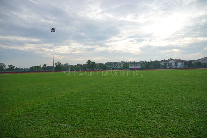 Artificial Track and Field with Green Grass Combined with Artificial ...