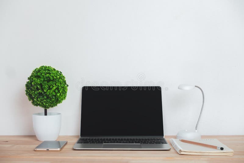 Artificial Tree with Notebook Laptop Mobile Phone and Pencil on Stock ...