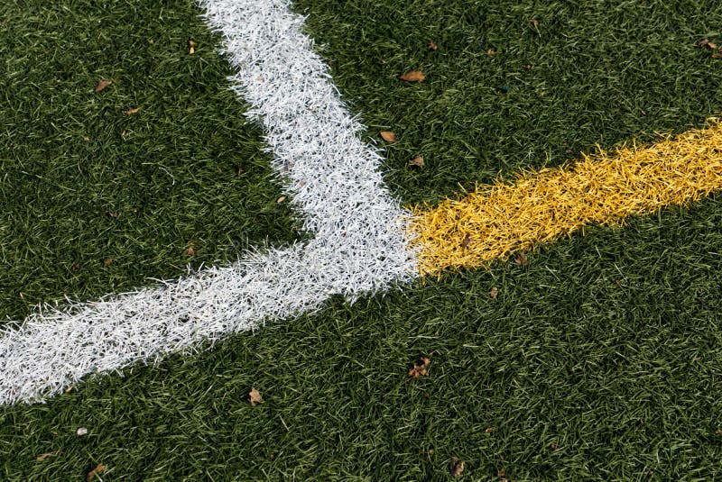 Artificial Turf Sports Field with White and Yellow Lines Stock Photo ...