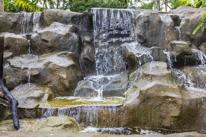 Artificial waterfall stock image. Image of environment - 214270071