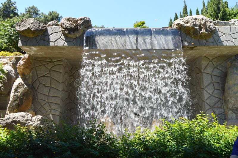 Artificial Waterfall with Water Jets, Modern Stone Structure, Beautiful ...
