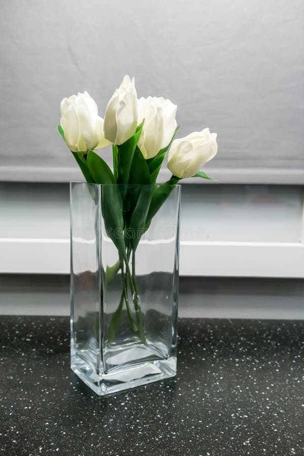 Artificial White Roses in Square Glass Stock Photo - Image of ...