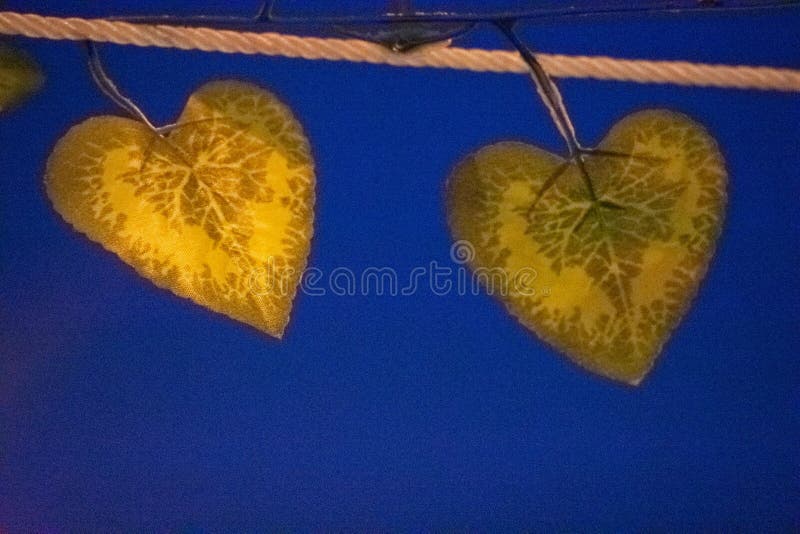 Artificial Leaves on a String Stock Image - Image of night, festive ...