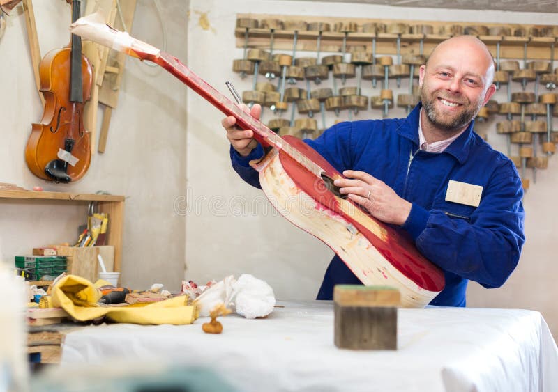 Artisan Creating a Guitar in Workshop Stock Photo - Image of lifestyle ...