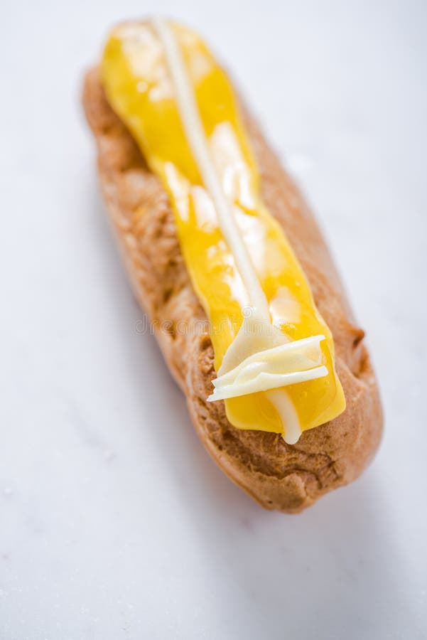 Artisan eclair sweet treat stock photo. Image of profiterole - 68234028