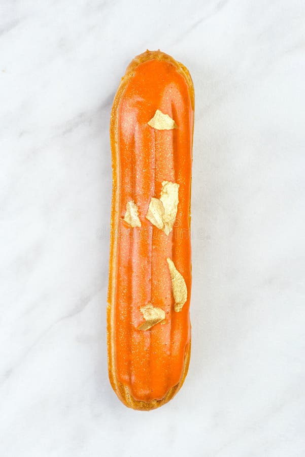 Artisan French Eclair Decorated on White Marble Stock Image - Image of ...