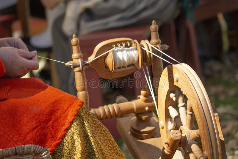 Artisan Makes Yarn with Spinning Wheel Stock Image - Image of artisan ...