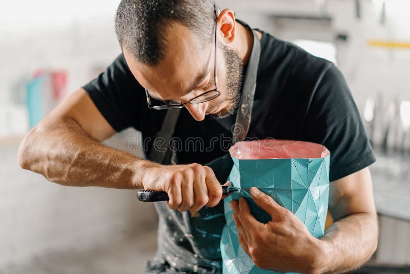 Artisan Sculptor Artist Creates a Work of Art in His Workshop Stock ...