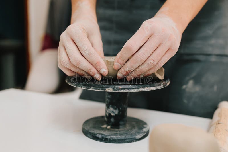 Artisan Sculpts Ceramic Bowl Using Potter& X27;s Wheel. Hands Shaping ...