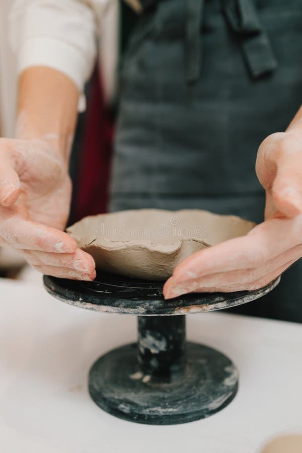 Artisan Sculpts Ceramic Bowl Using Potter& X27;s Wheel. Hands Shaping ...