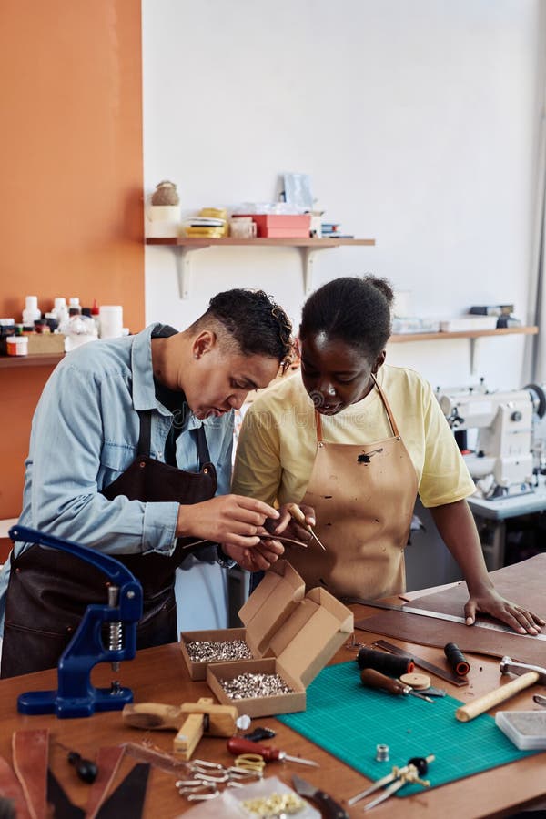 Artisan Teaching Apprentice Leather Work Stock Image - Image of black ...