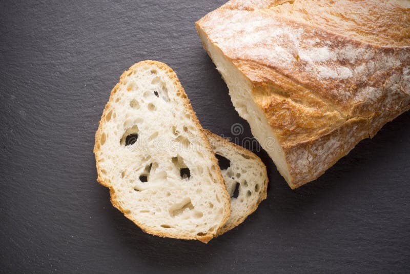 Artisan Traditional Bread on Dark Slate Stock Photo - Image of texture ...