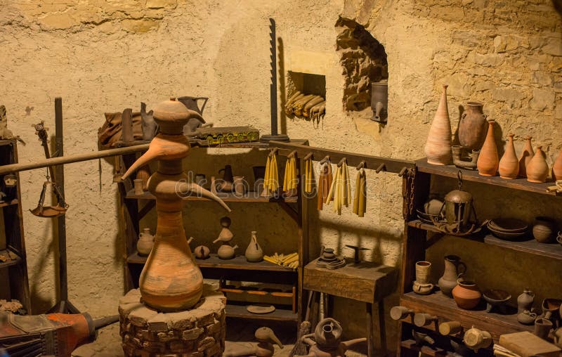 Artisans Create Traditional Pottery and Crafts in a Historic Workshop ...