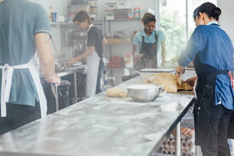 Artisans Making Bread on Top Aluminium Table with Flour Over Table ...