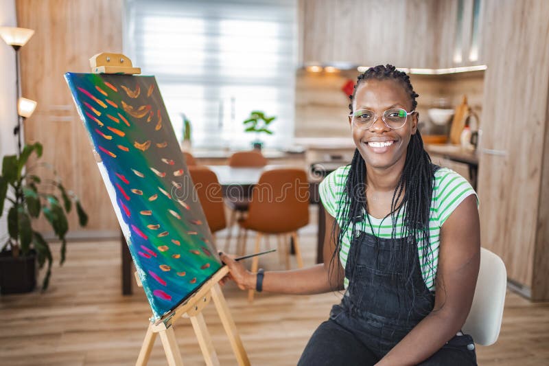 Artist Creating a Vibrant Masterpiece in a Studio Stock Image - Image ...