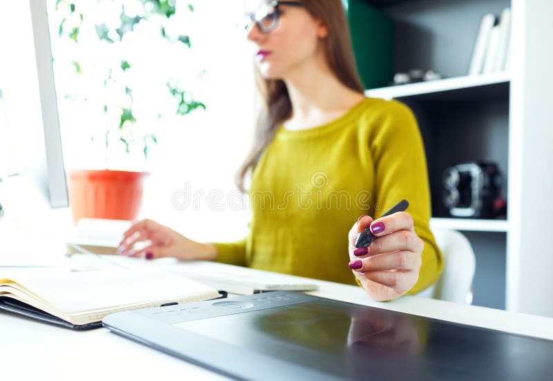 Artist Drawing Something on Graphic Tablet at the Home Office Stock ...