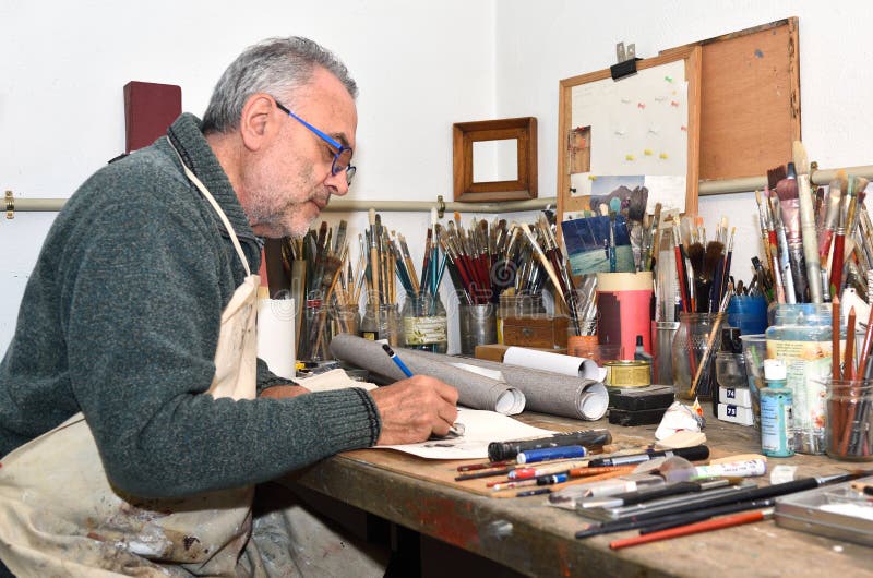 Artist Drawing Portrait of Beautiful Model in Art-Studio Stock Image ...