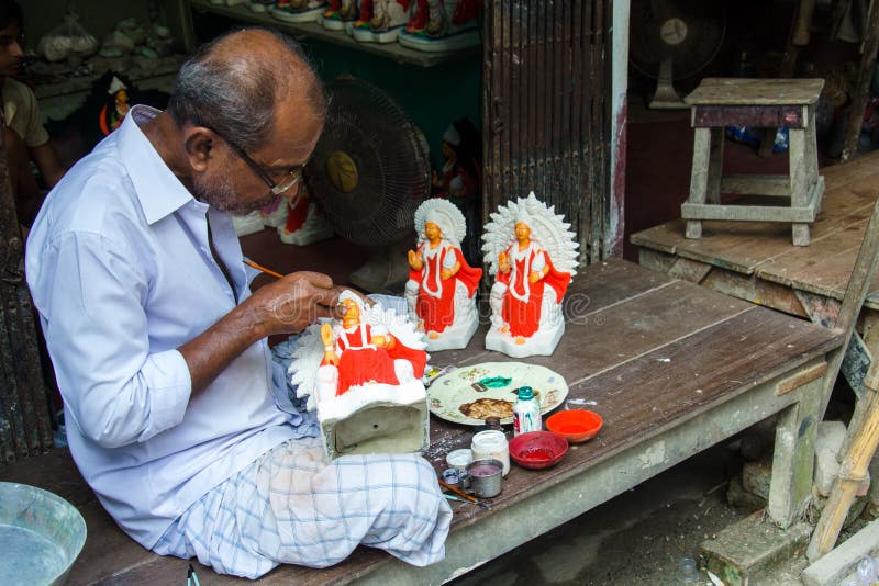 An Artist at Intense Work at His Workplace. Editorial Image - Image of ...