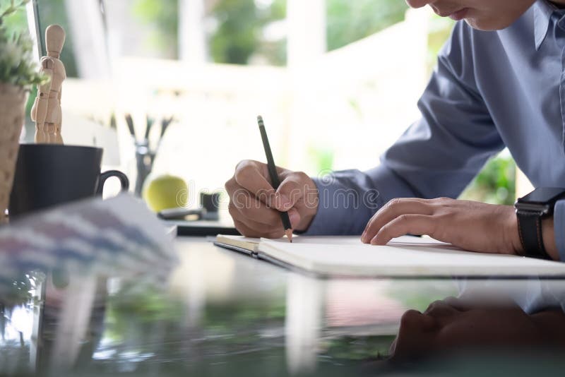 Artist Man Working Writing on Paper Note. Stock Image - Image of ...